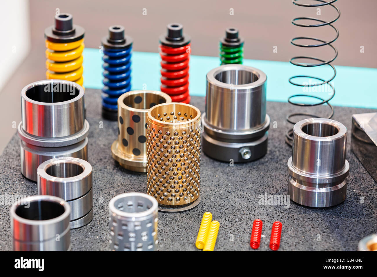 Closeup new design of parts for machine on exhibition show; note ...