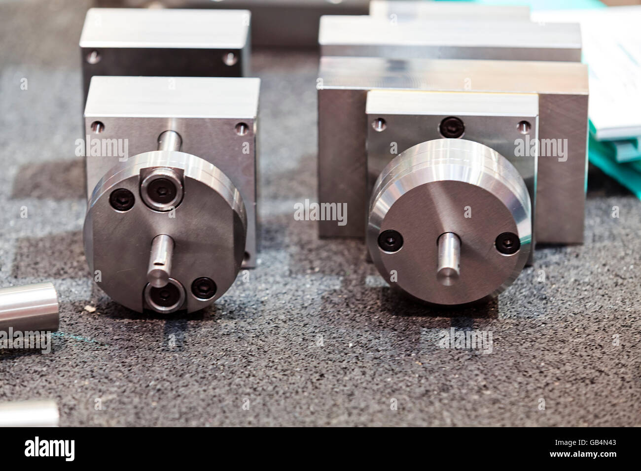 Closeup new design of parts for machine on exhibition show; note ...