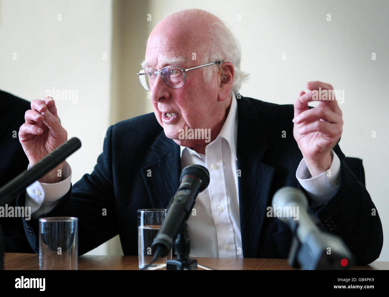 Professor Peter Higgs departs a press conference at Edinburgh ...