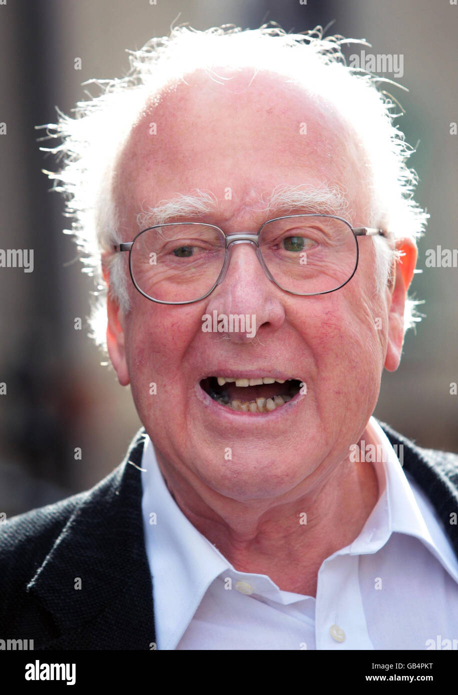 Professor Peter Higgs departs a press conference at Edinburgh ...