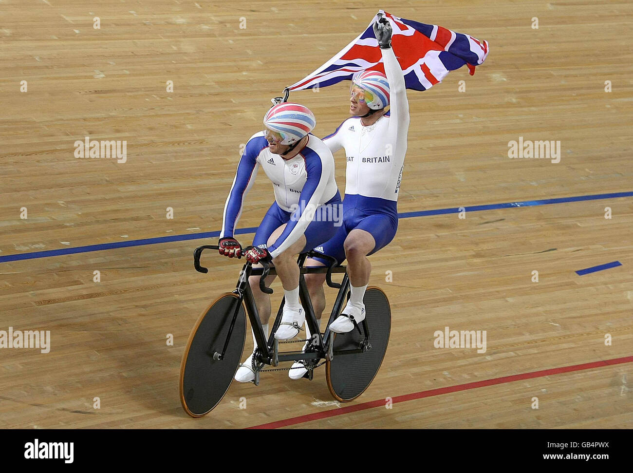 Four male track athletes hi-res stock photography and images - Alamy