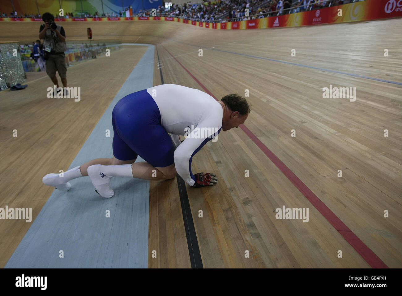 Great Britain's Barney Storey kissing the track after capturing gold in ...