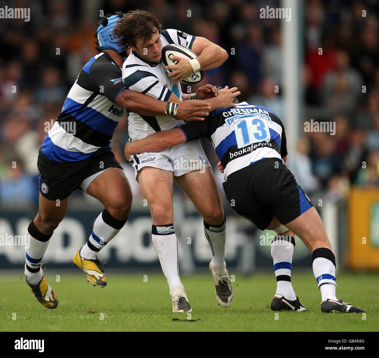 Bath's Tom Cheeseman (r) Eliota Fuimaono-Sapolu (r) and attempt to ...