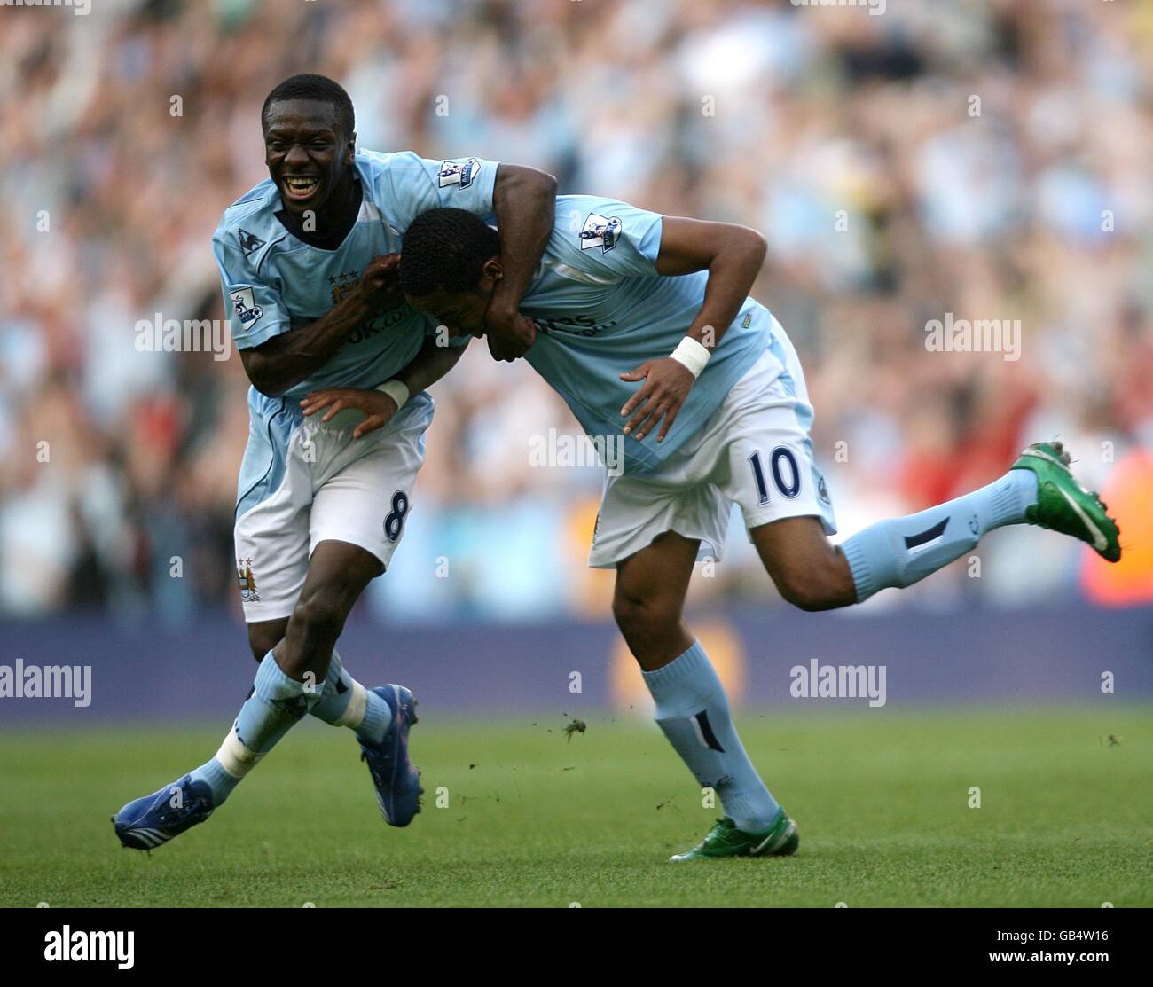 Manchester City's De Souza Robinho (r) celebrates scoring his sides ...