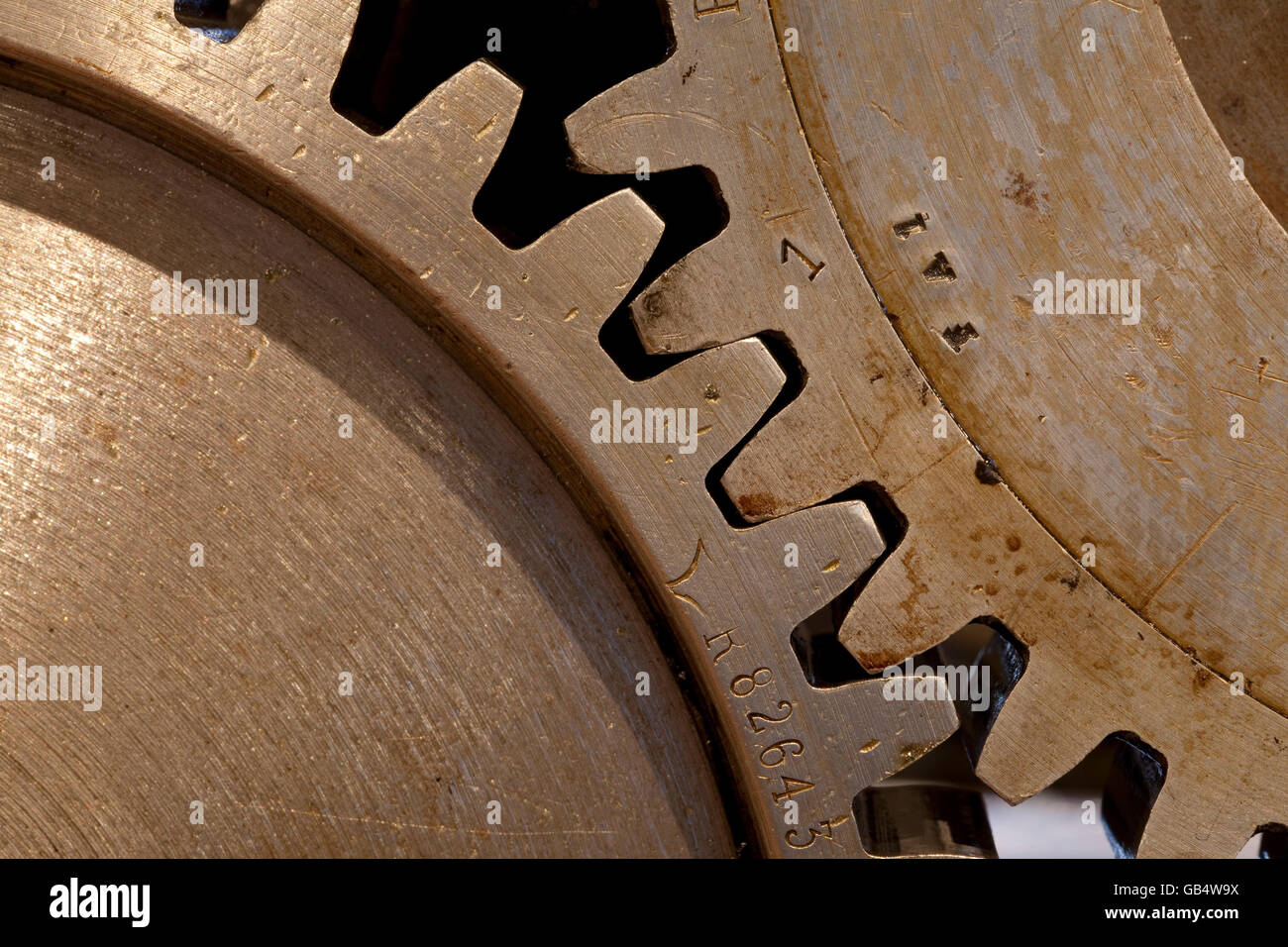 Interlocking gear wheels, detailed view Stock Photo - Alamy
