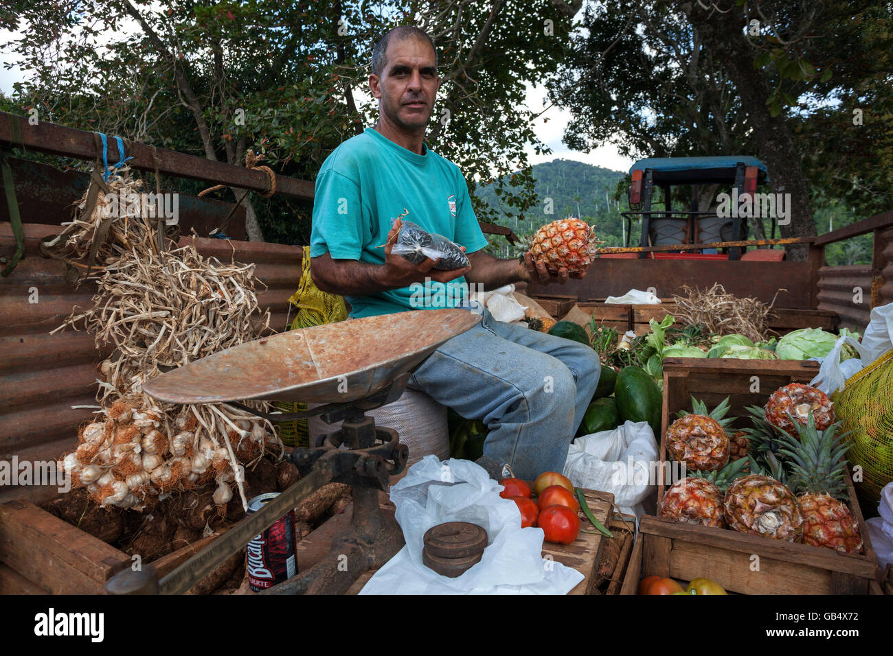 Fruit seller, vegetable seller, sale on the platform of a car trailer ...