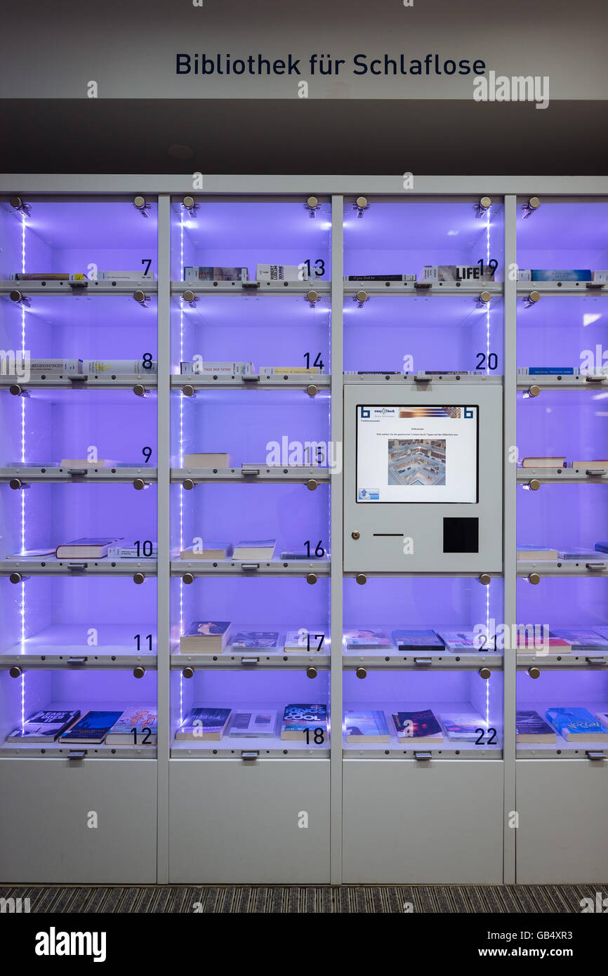 Shelves with books and DVDs, 24 hour library for insomniacs, city ...