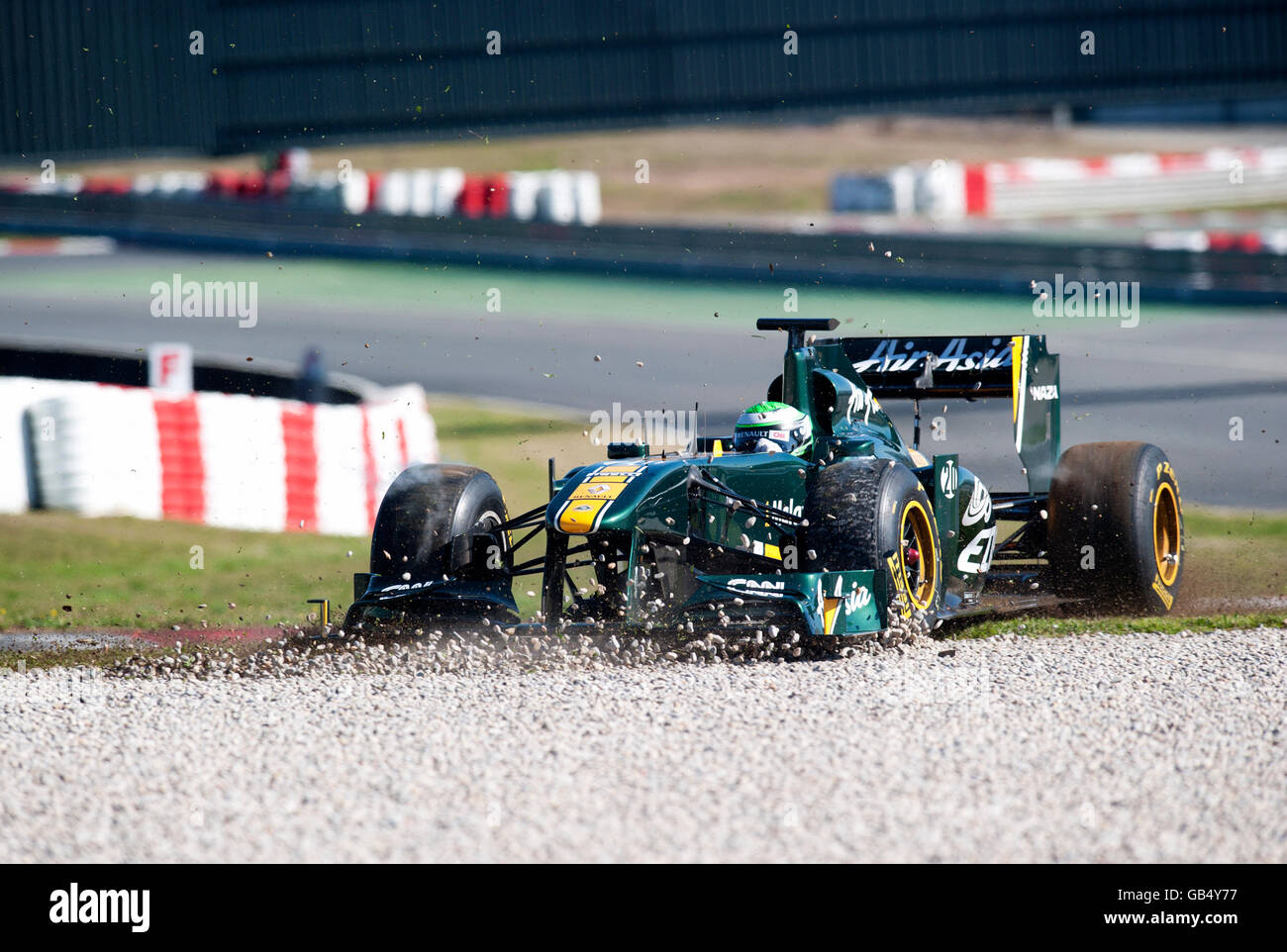 Heikki Kovalainen, Finland, with his Team Lotus-Cosworth T128 race car ...