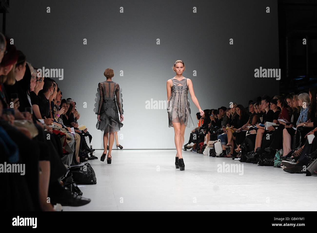 Models wear creations by Christopher Kane, during London Fashion Week ...