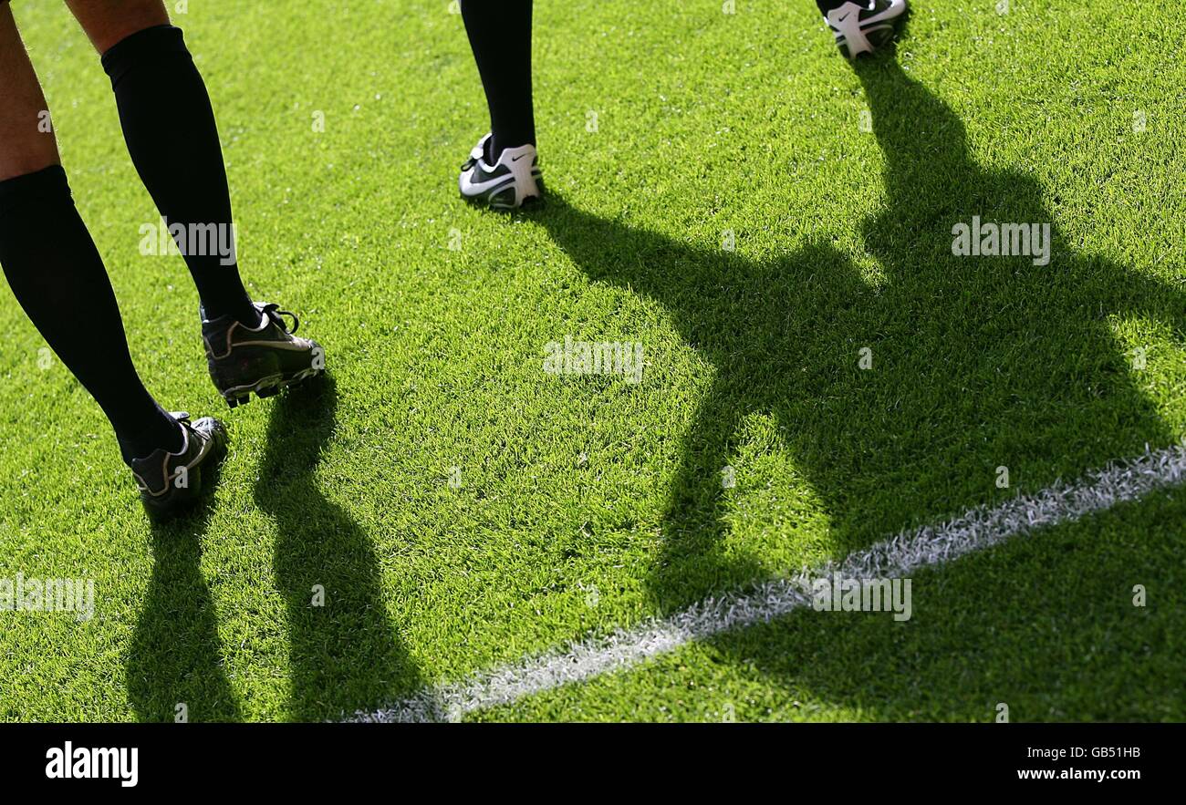Players shadows are cast on grass hi-res stock photography and images ...