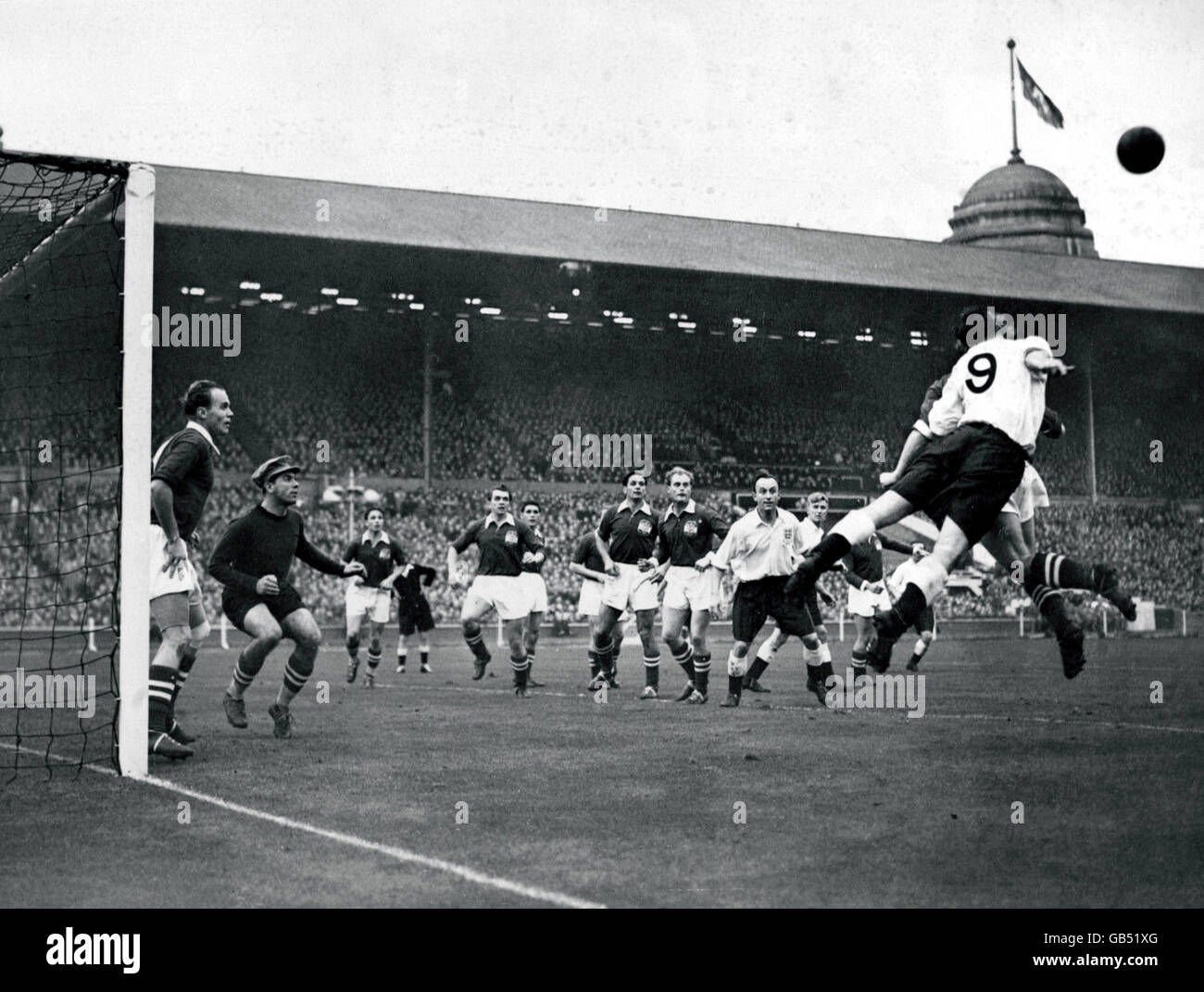 England's Nat Lofthouse (9) is beaten to a header in the Austria ...