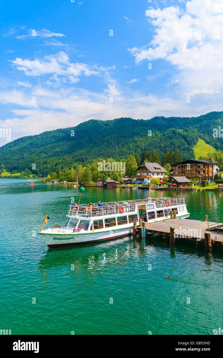 WEISSENSEE LAKE, AUSTRIA: tourist boat "Weissensee" mooring to pier on ...