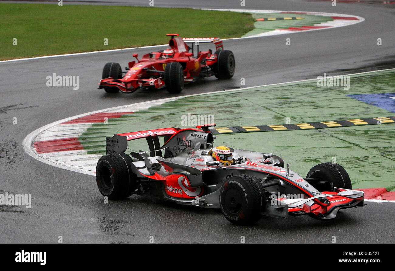 Lewis Hamilton leads Kimi Raikkonen through the first chicane after the ...