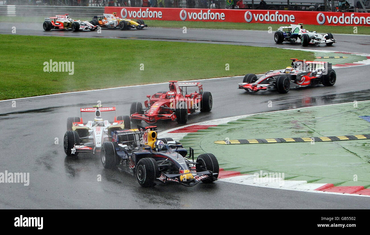 Red Bull Racing's David Coulthard leads the pack through the first ...