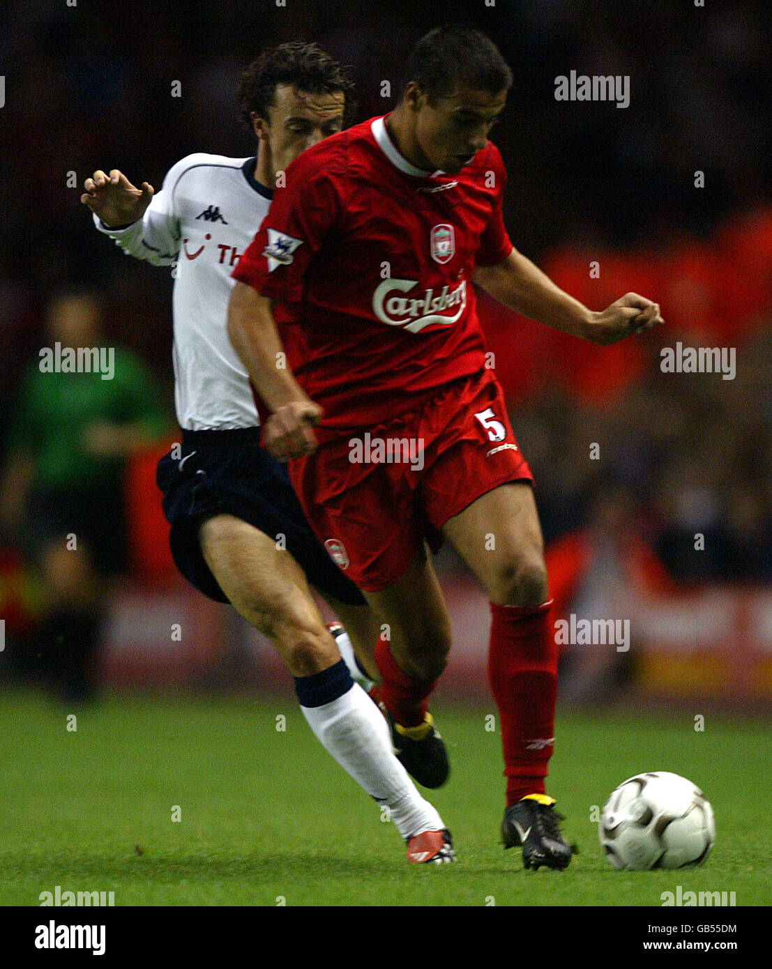 Liverpool's Milan Baros and Tottenham Hotspur's Simon Davies battle for ...