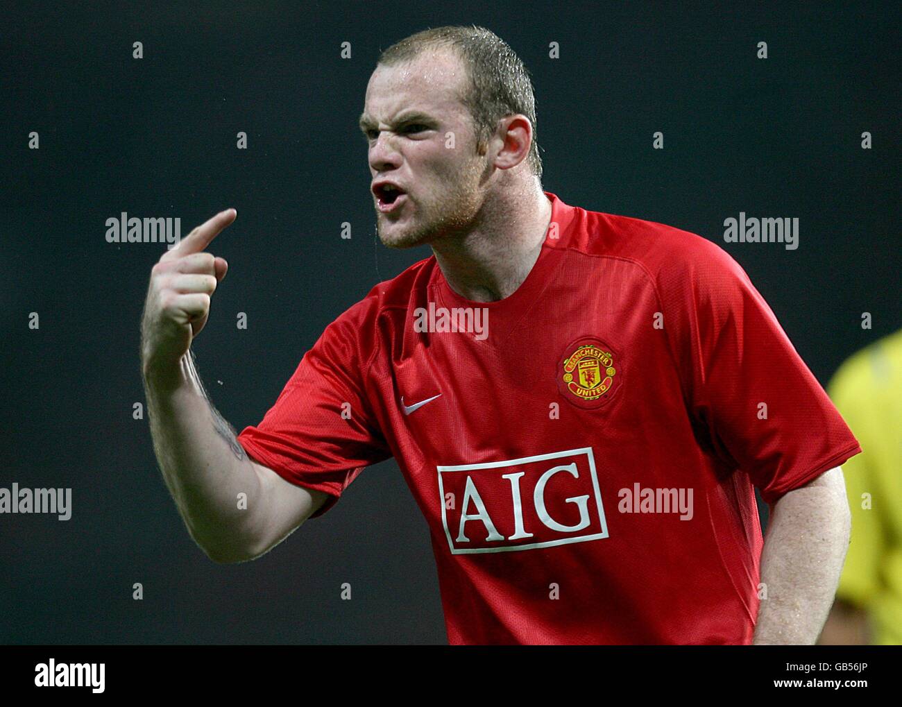 Manchester United's Wayne Rooney shows his frustration on the pitch ...