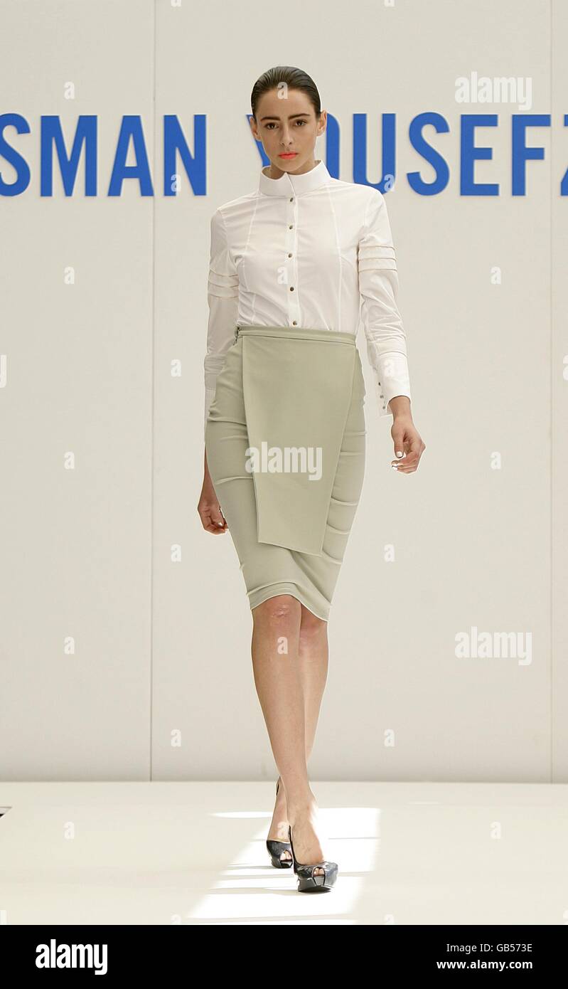 A model wears a creation by designer Osman Yousefzada, during London ...