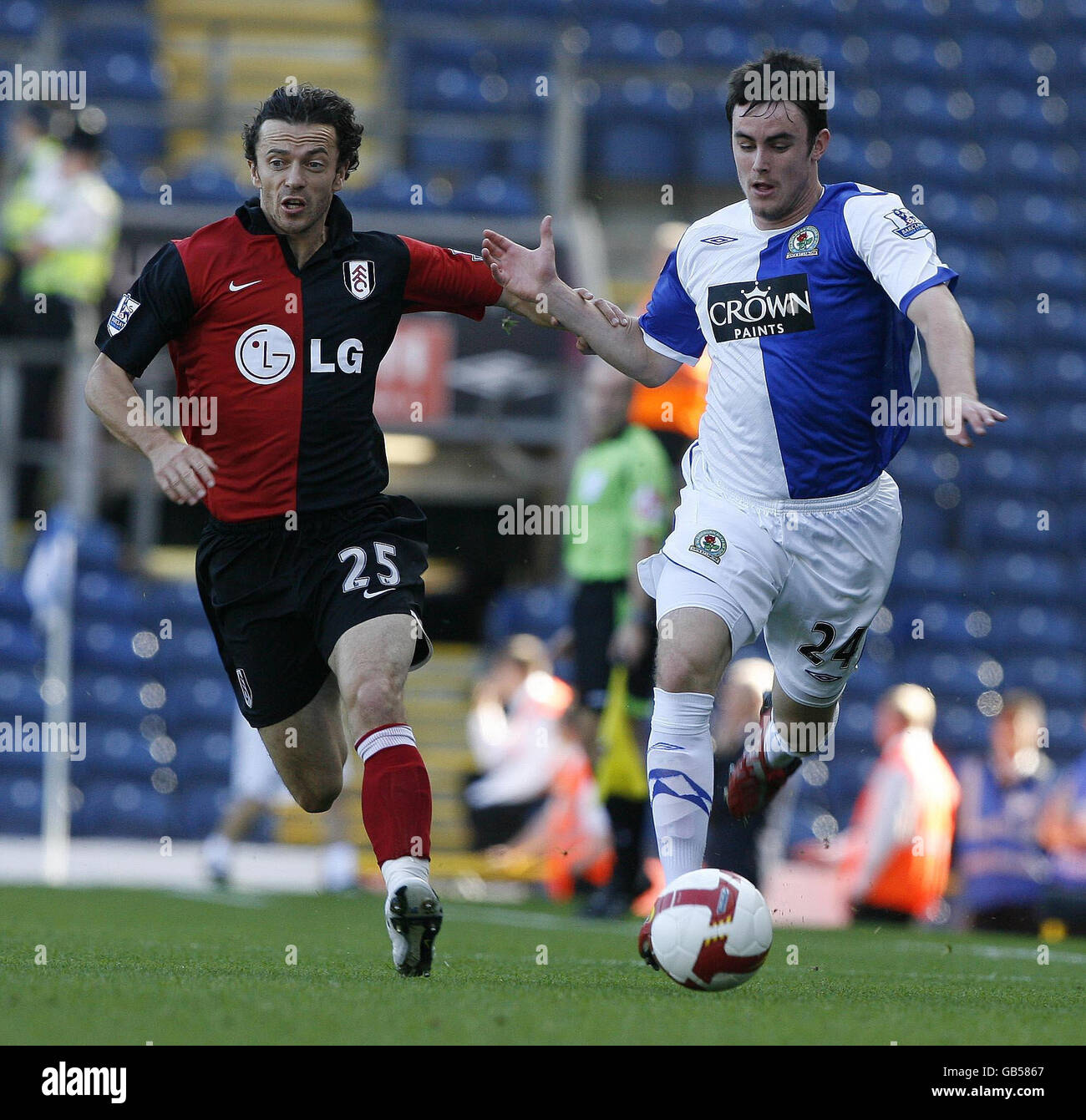 Blackburn Rover's Keith Treacy and Fulham Simon Davies battle for the ...