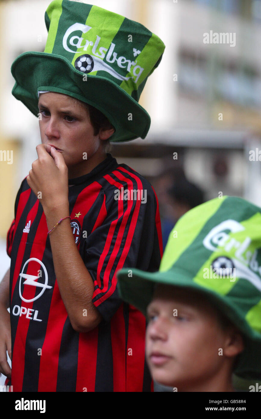 Ac milan fan gets into the spirit of the game hi-res stock photography ...