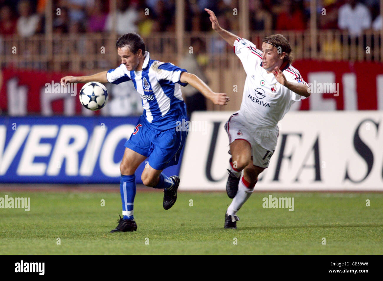 Fc portos dmitri alenichev ac milans dario simic battle ball hi-res stock photography and images ...