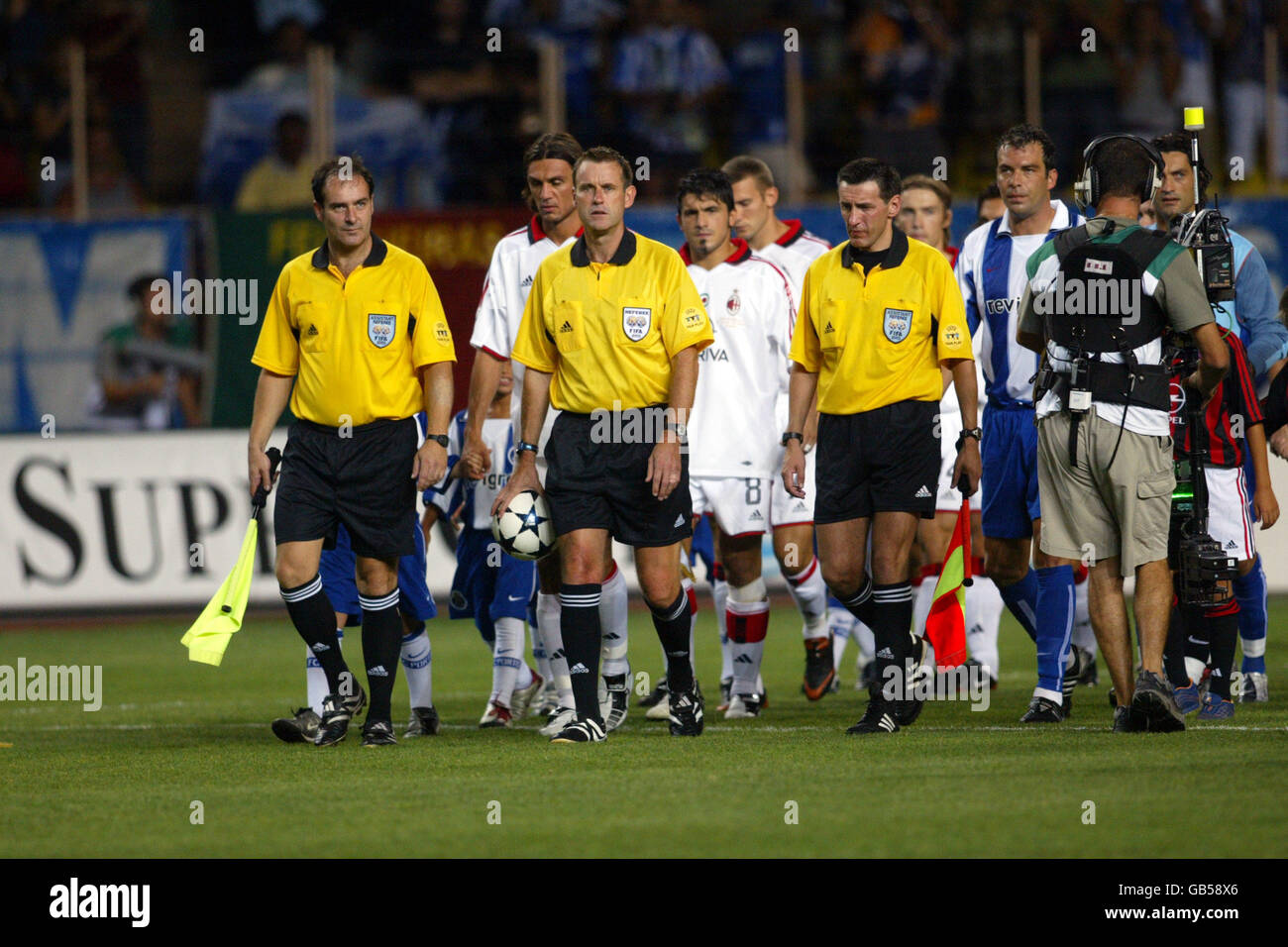 Soccer - UEFA Super Cup - FC Porto v AC Milan. Referee Graham Barber (c ...