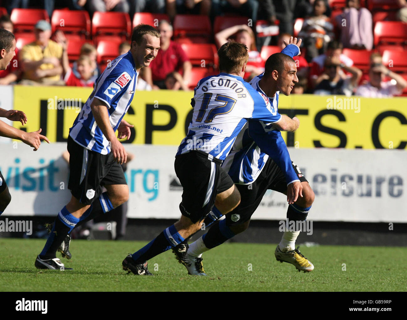 Sheffield Wednesday's Marcus Tudgay is grabbed by teammate James O ...