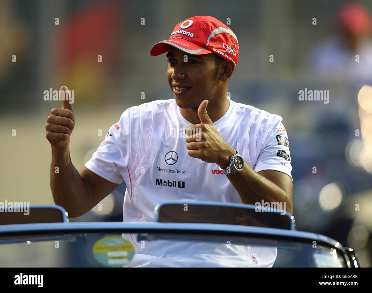 Vodafone McLaren Mercedes' Lewis Hamilton is paraded in a vintage ...