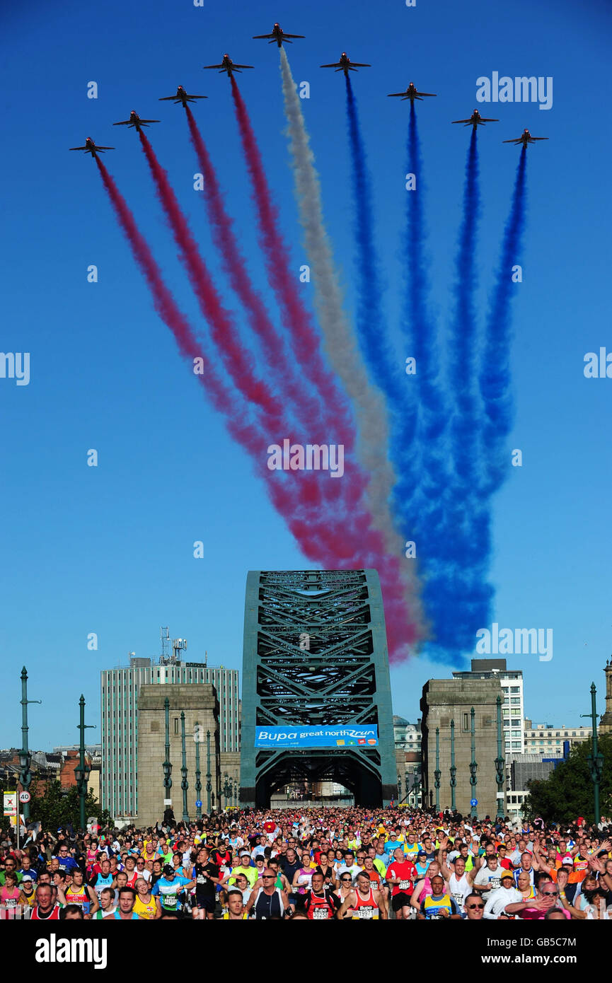 The Red Arrows fly over the Tyne Bridge during the BUPA Great North Run ...