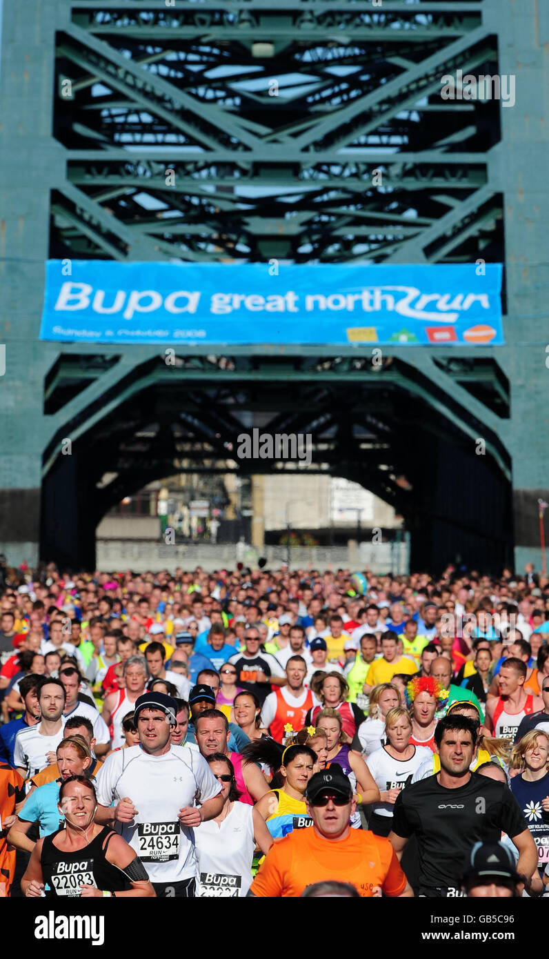 Competitors make their way across the Tyne Bridge during the BUPA Great ...