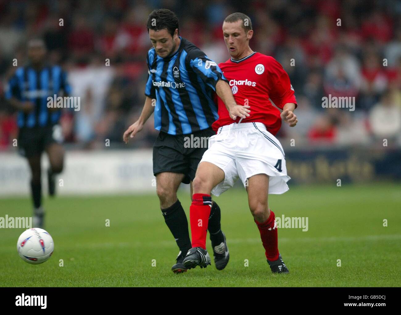 Crewe Alexandra's Kenny Lunt and Nottingham Forest's Andy Reid battle ...
