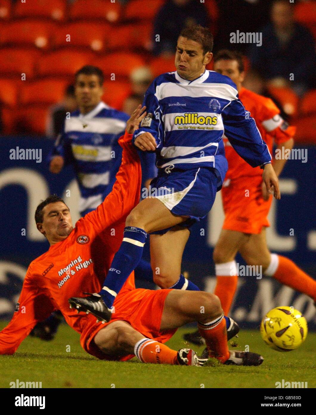 Dundee United's Charlie Miller tackles Mario Maisano of Morton Stock ...