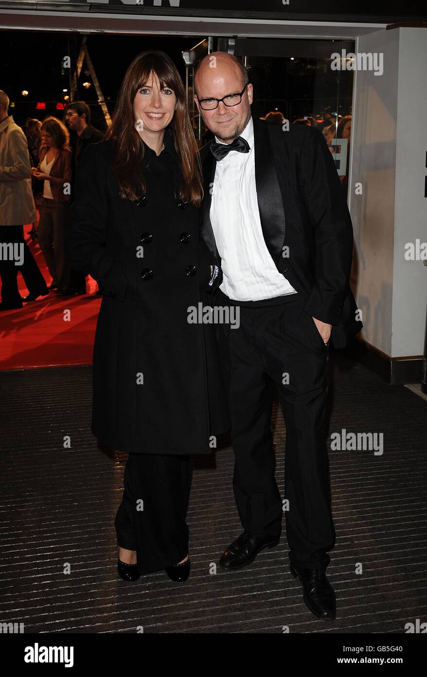 Toby Young (r) and guest arrives for the premiere of 'Frost Nixon' at ...