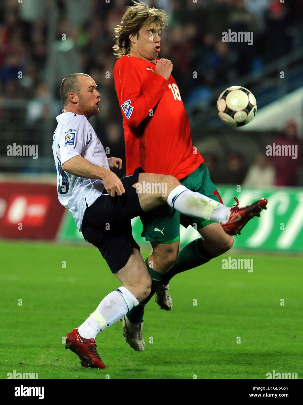 England's Wayne Rooney in action with Belarus' Dmitry Verkhovtsov ...