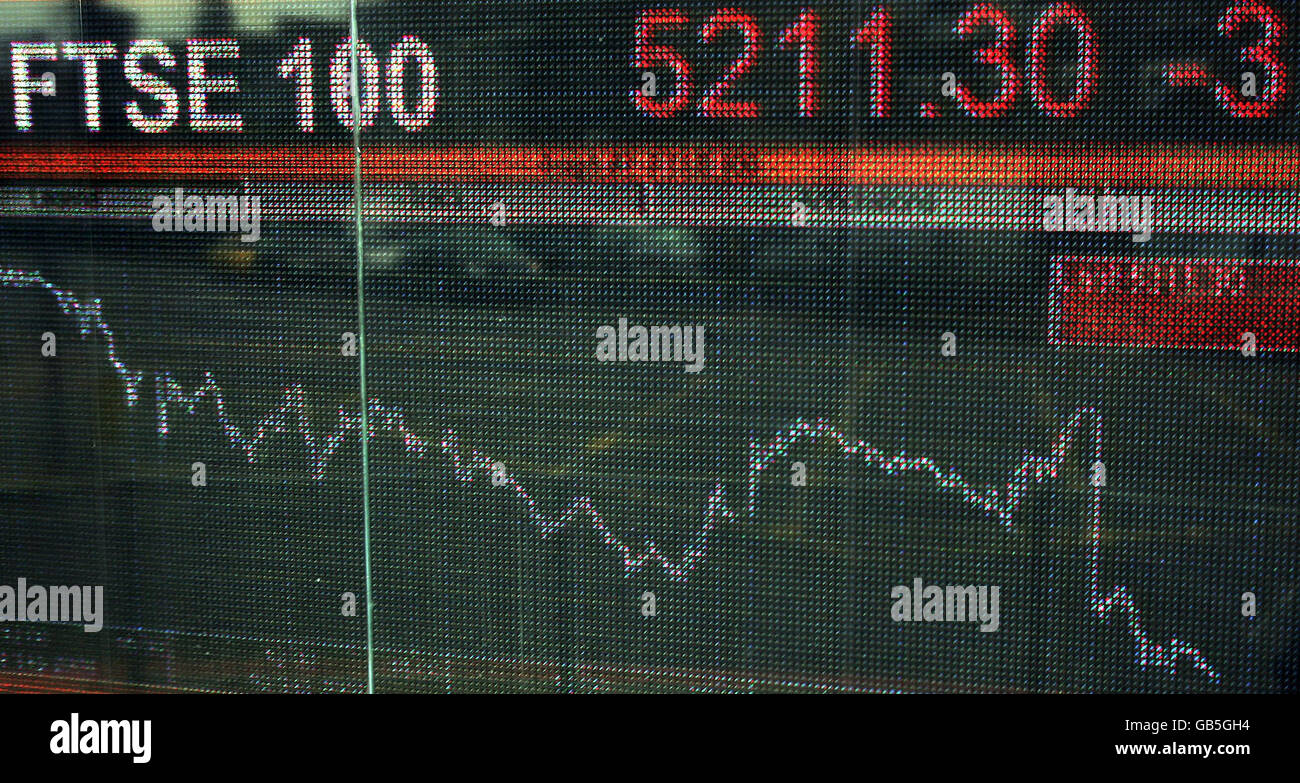 Lehman Brothers collapse. A big screen showing a FTSE 100 graph in ...