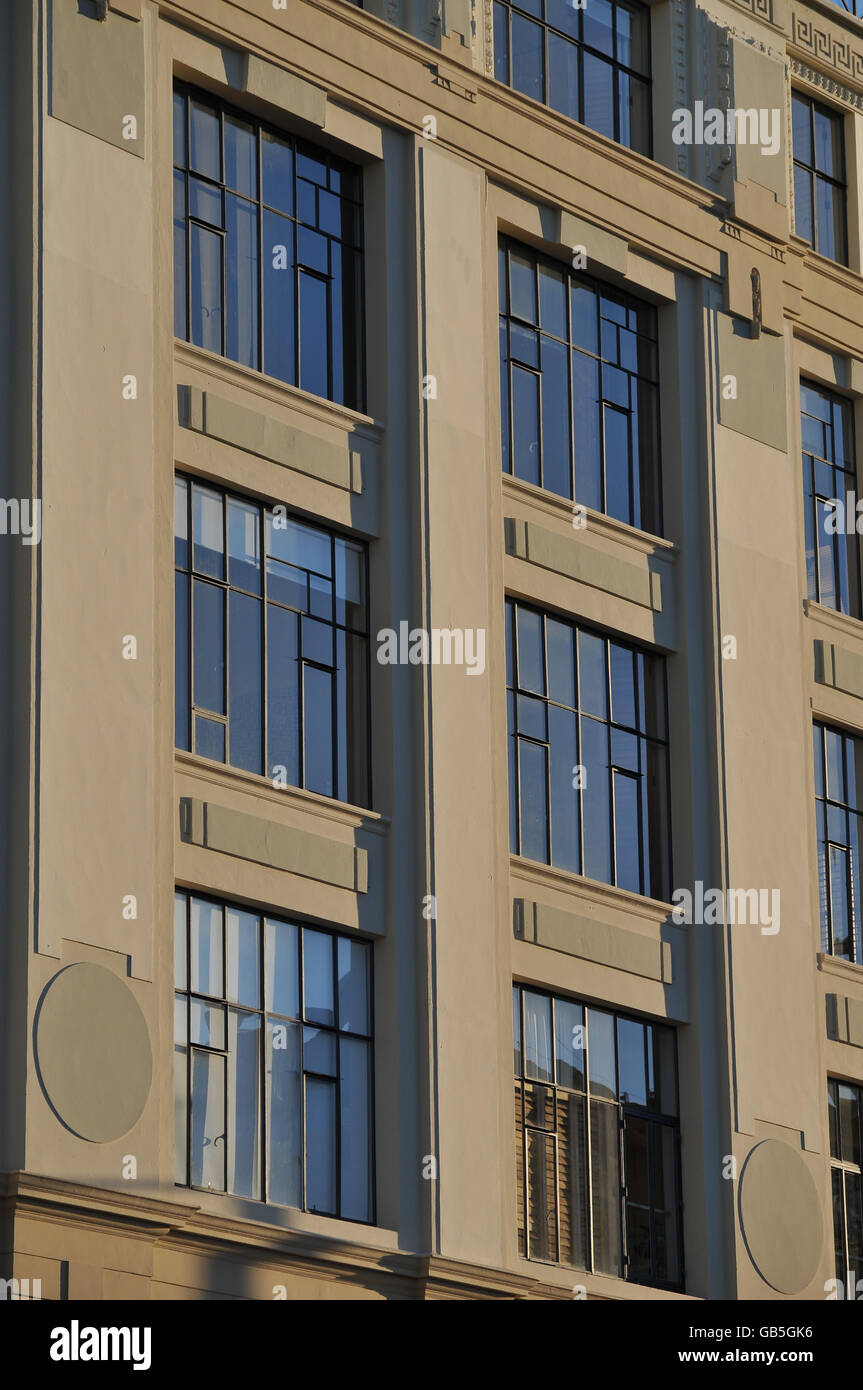 Pretty Window Design on City Apartment Building Stock Photo - Alamy