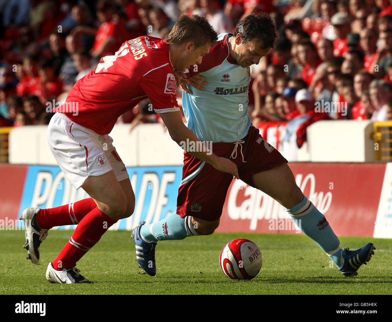 Nottingham Forest's Luke Chambers and Burnley's Robbie Blake battle for ...