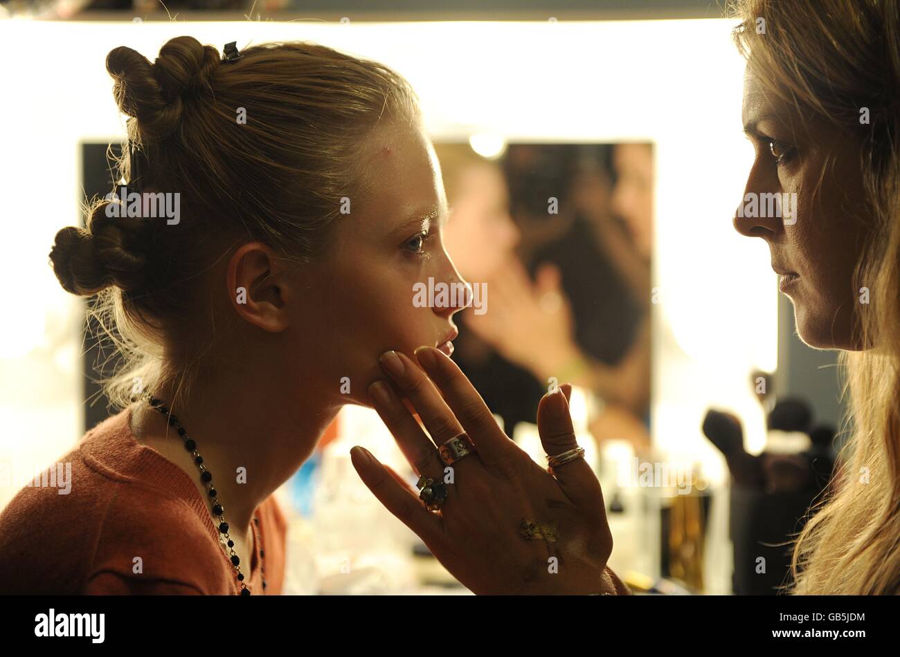 Models backtsage at the Armand Basi One catwalk show during London ...