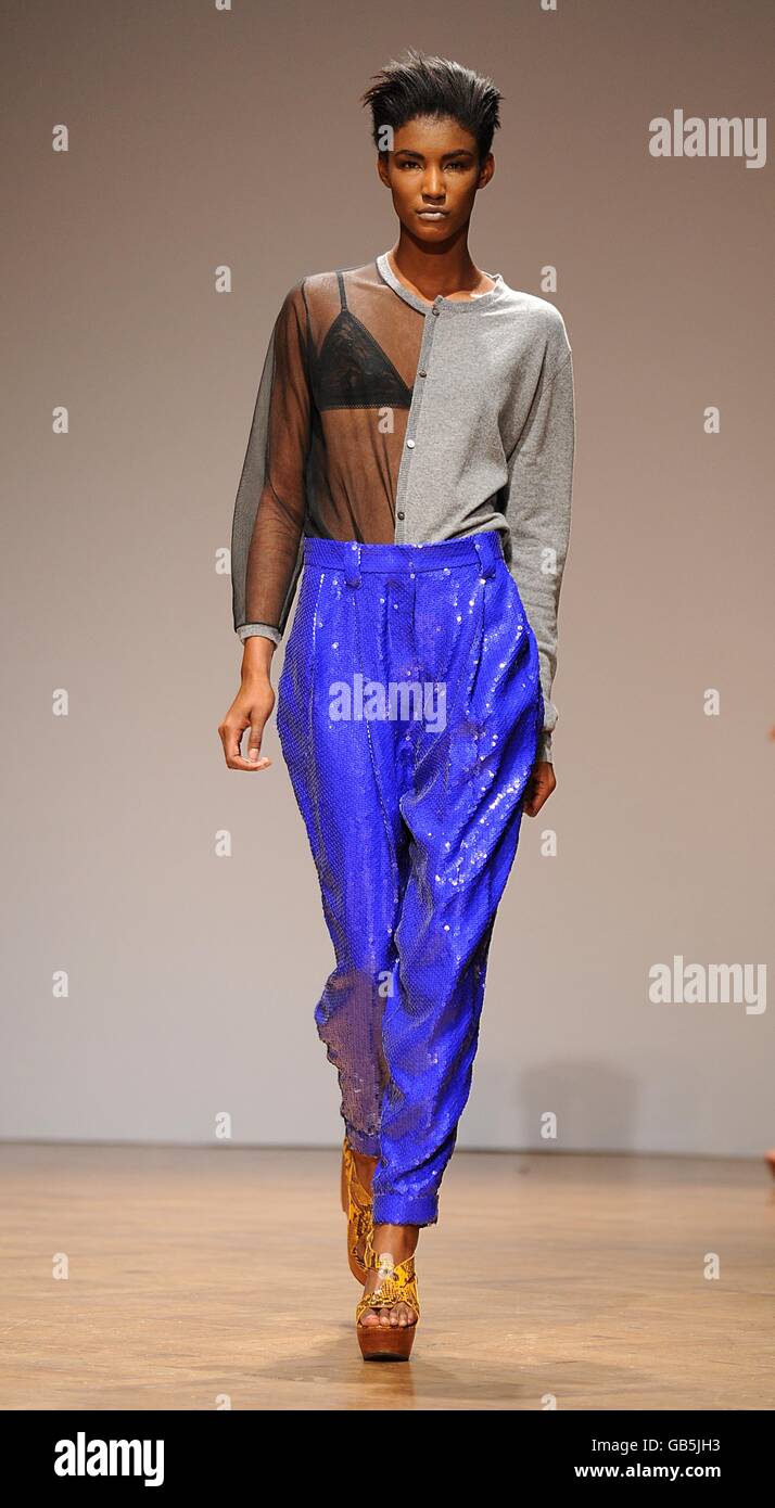 A model wears a creation by Armand Basi One during London Fashion Week ...