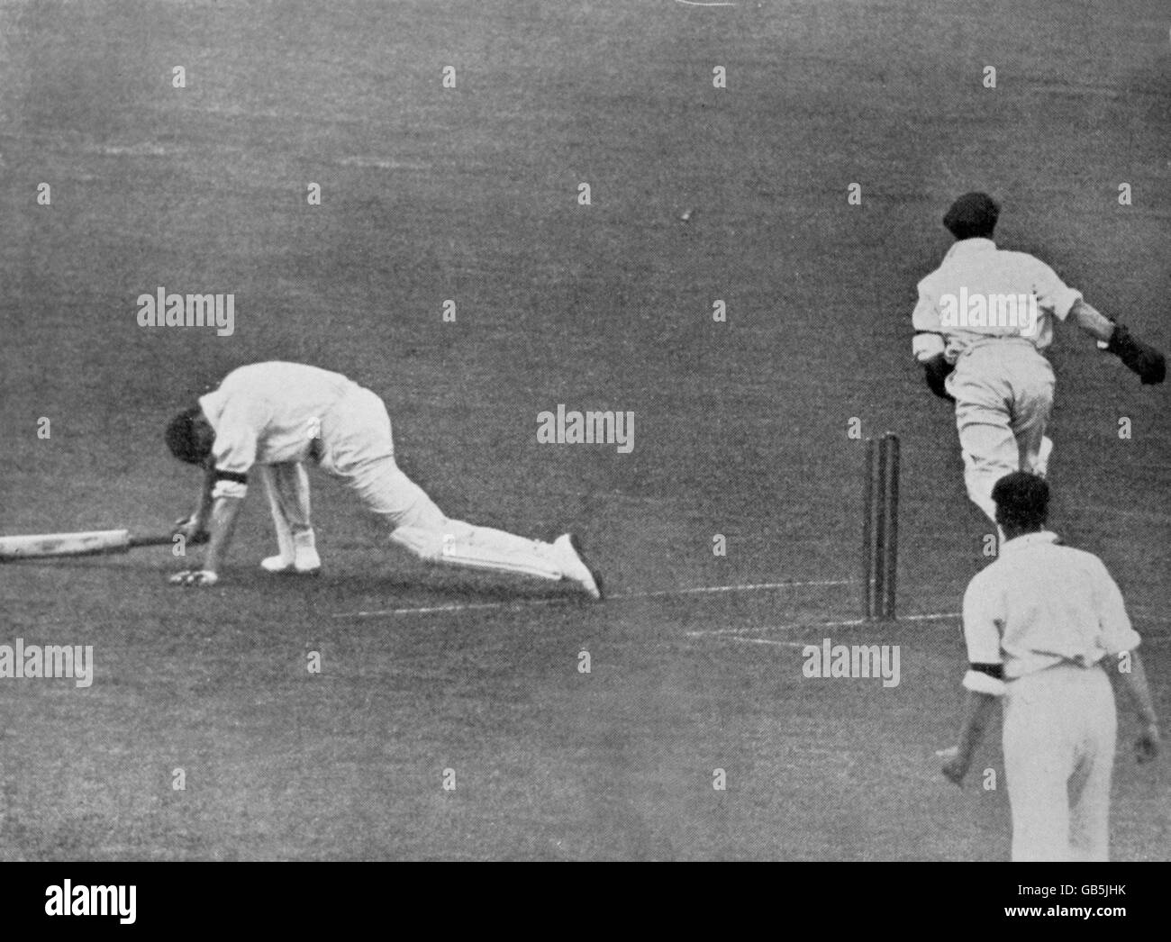 (L-R) England's Frank Woolley tries in vain to regain the crease as he ...