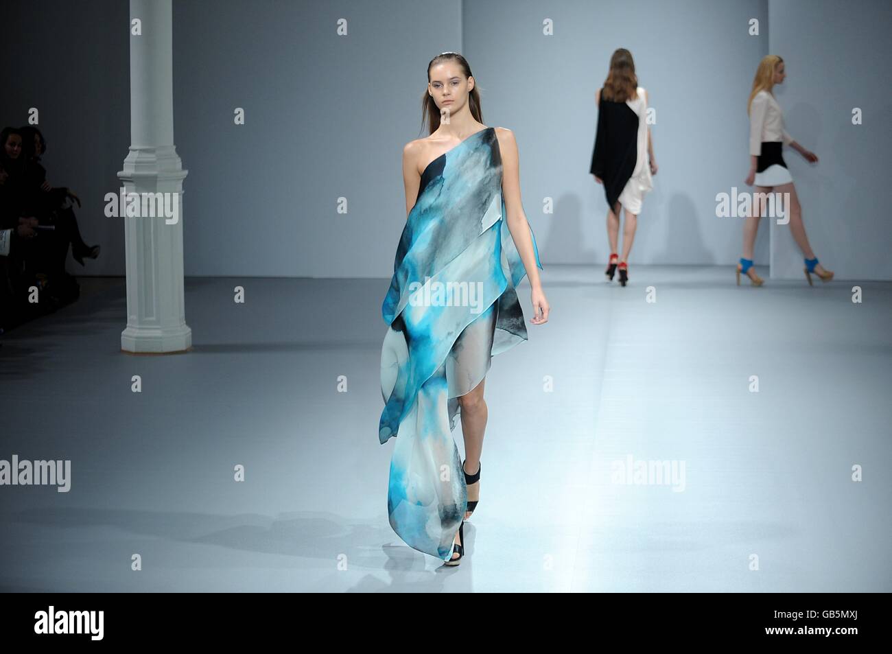 London Fashion Week - Josh Goot Catwalk Show. A model wears a creation ...