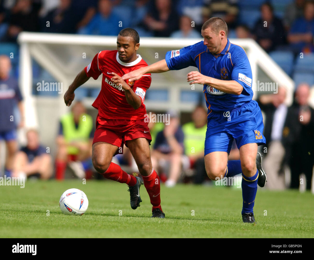 Shrewsbury Town's David Ridler (R) and Tamworth's Tristam Whitman ...