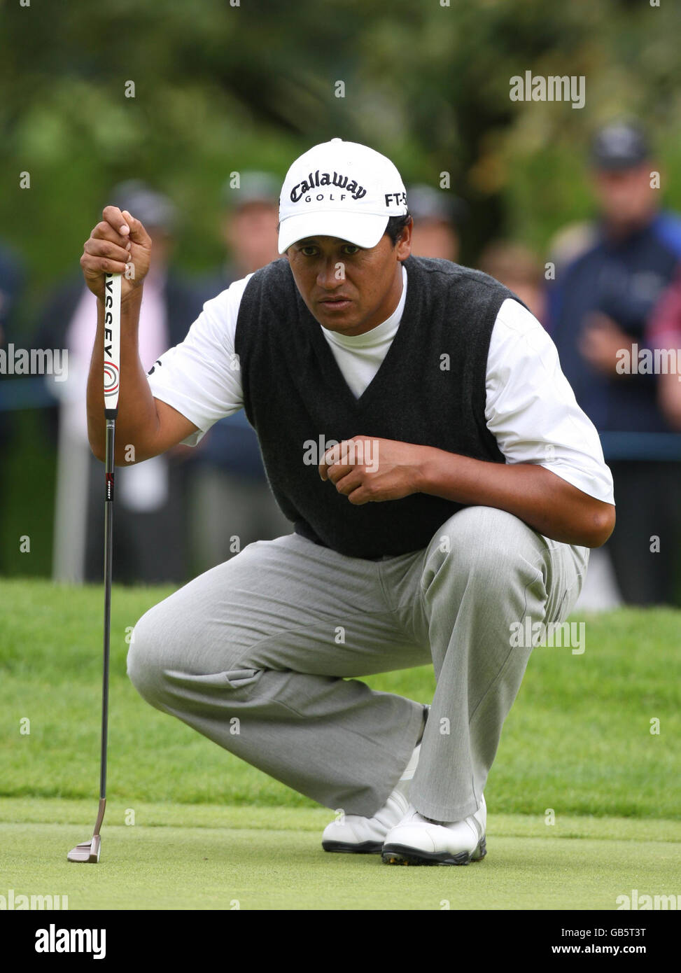 New Zealand's Michael Campbell line's up a putt on 5th green during the ...
