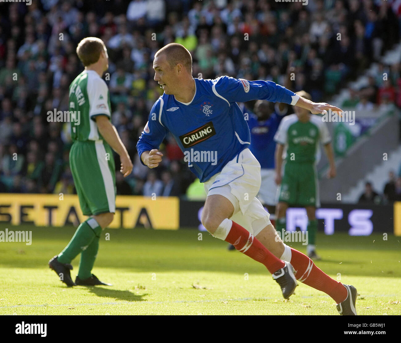 Kenny Miller of Rangers celebrates scoring his first goal during the ...