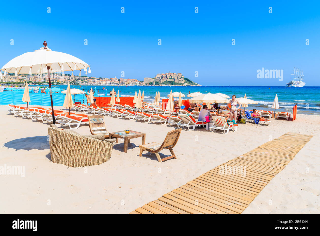 CALVI, CORSICA ISLAND - JUN 28, 2015: A view of Calvi beach with ...