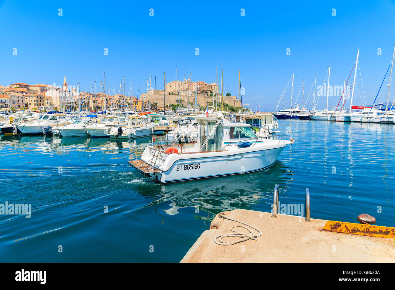 CALVI, CORSICA ISLAND - JUN 28, 2015: tourist boat departing Calvi port ...