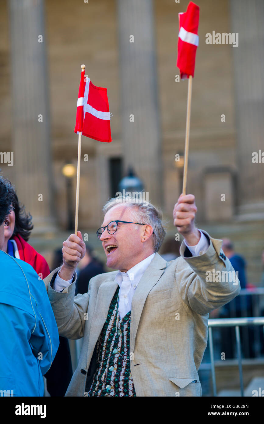 a man waves danish flags at a pro EU rally in Liverpool Stock Photo - Alamy