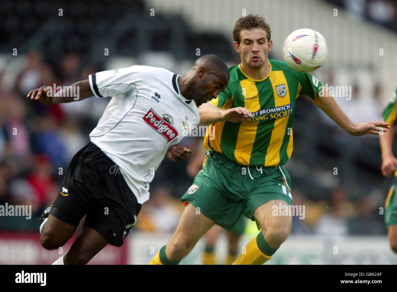 (L-R) Derby County's Michael Johnson heads the ball past West Bromwich ...