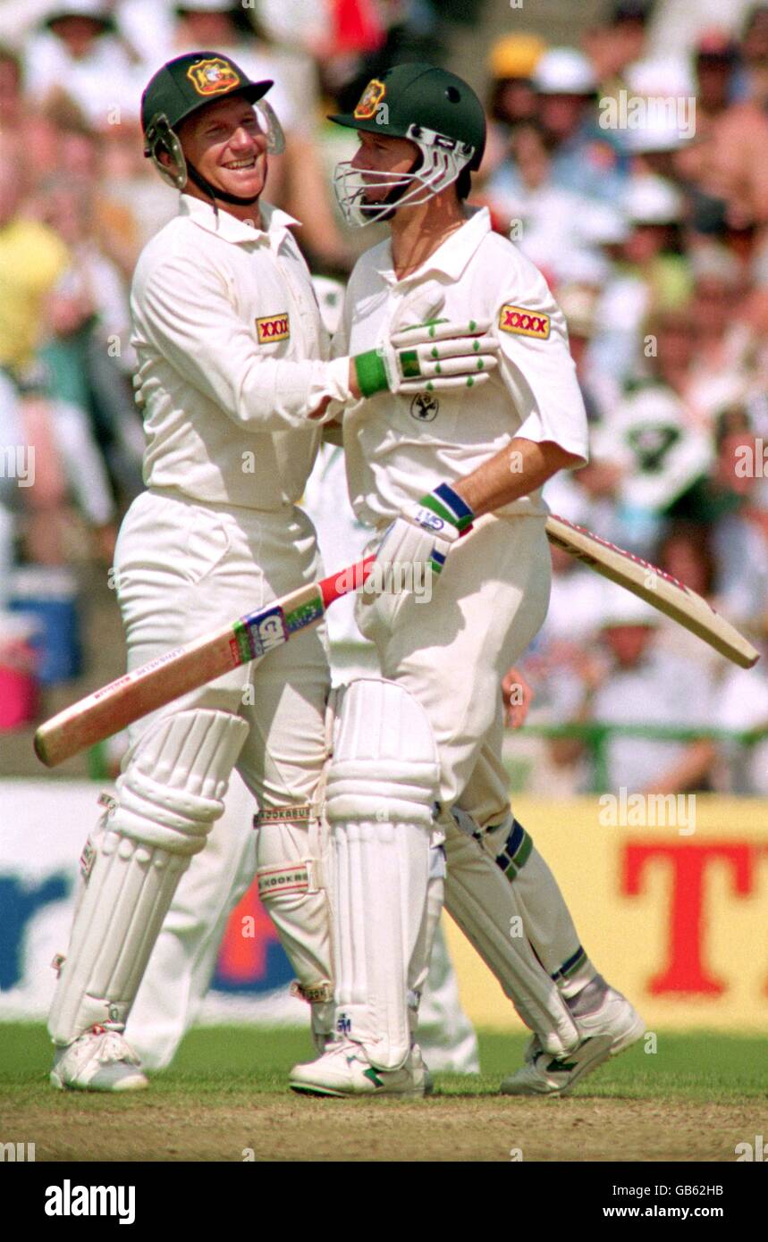Australia's Michael Bevan and Ian Healy celebrate the dismissal of ...
