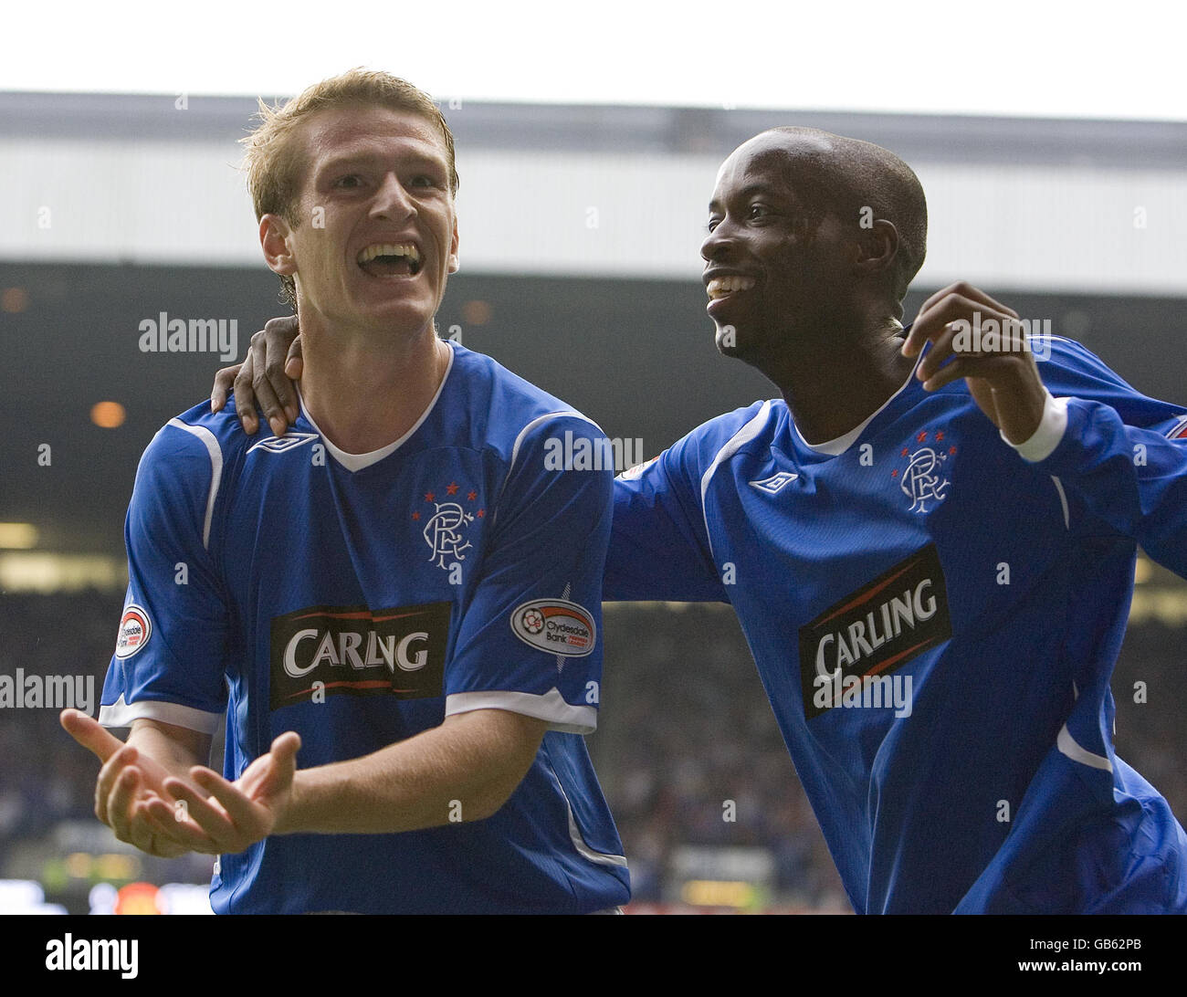 Rangers' Steven Davis celebrates with DaMarcus Beasley after scoring ...