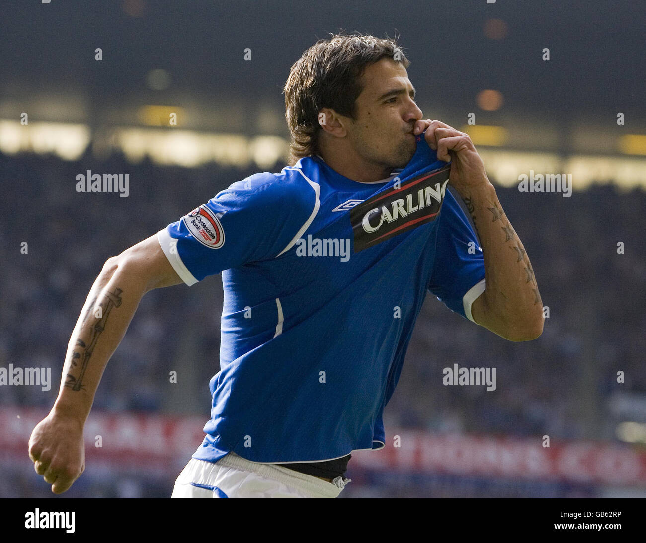 Rangers' Nacho Novo celebrates after scoring during the Clydesdale Bank ...